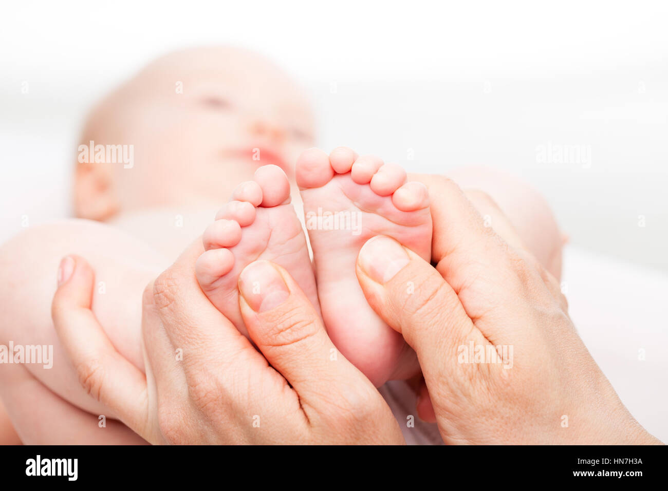 Child foot massage hi-res stock photography and images - Alamy