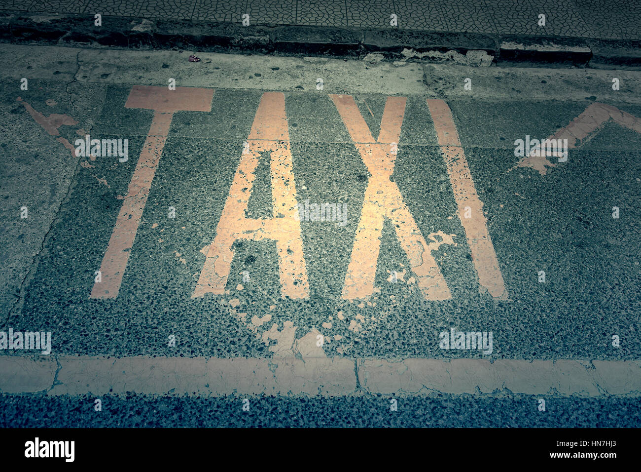 Taxi sign on asphalt, detail of a traffic signal, information and ...