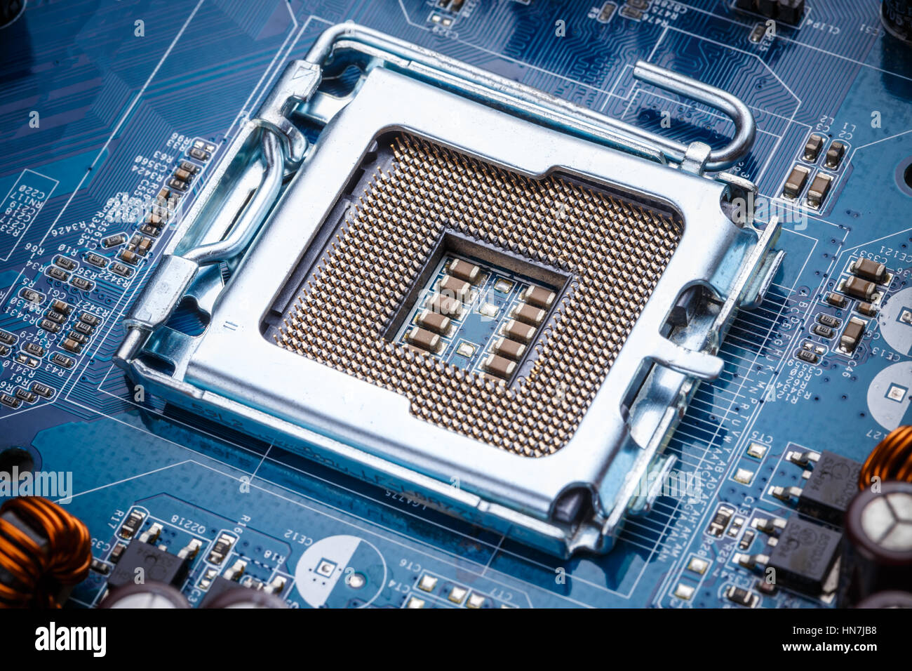 Blue electronic circuit board close up shot Stock Photo - Alamy
