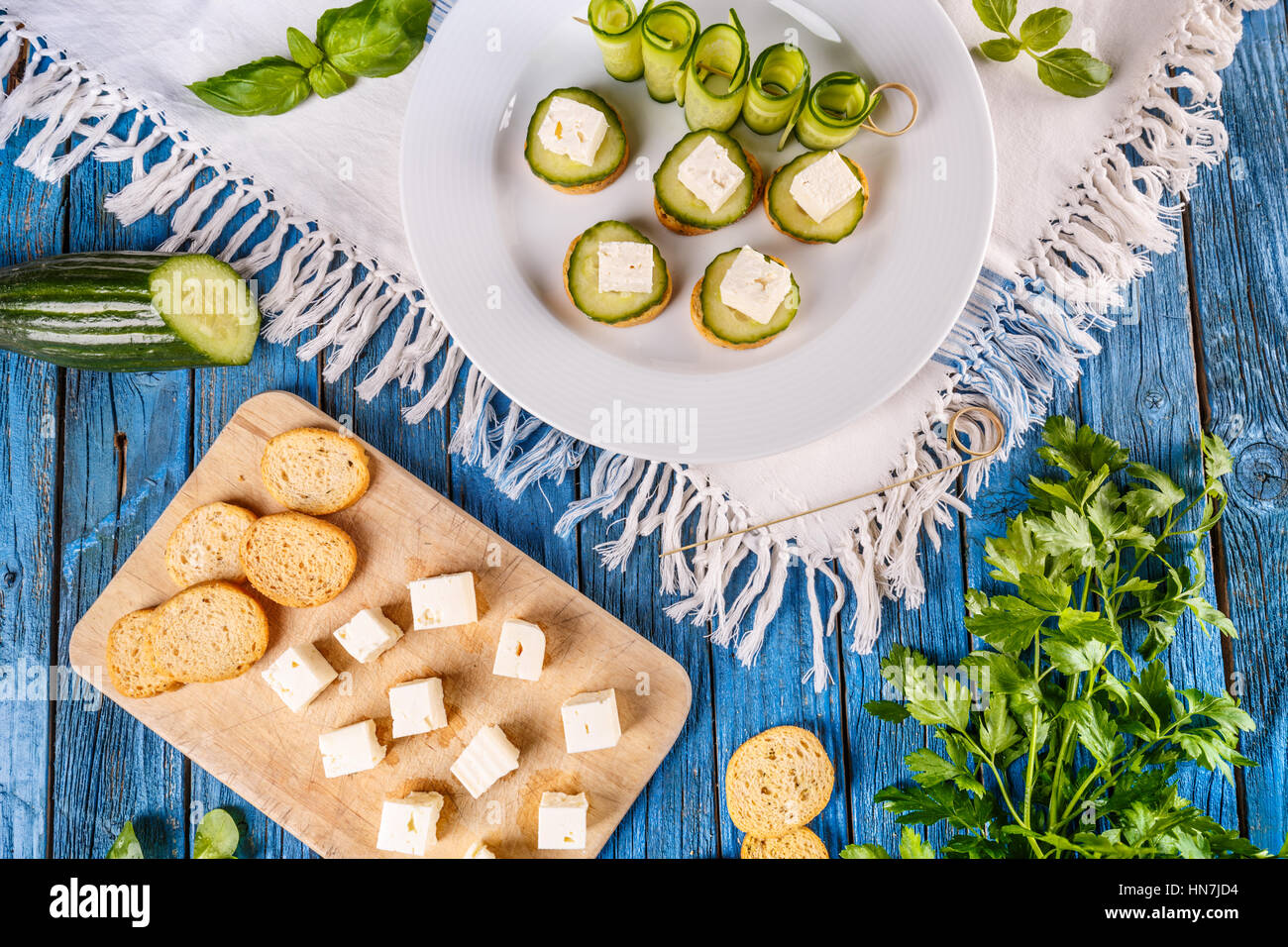 Healthy finger foods with bread rusks, feta cheese and cucumber Stock ...