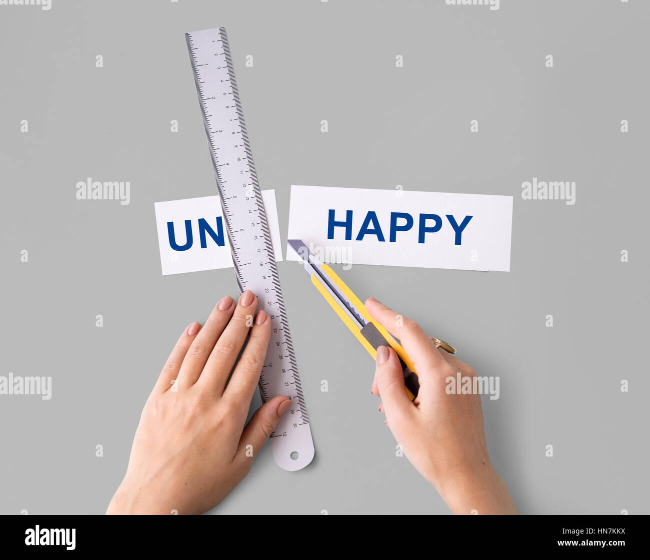Unhappy Sadness Hand Cut Word Split Concept Stock Photo - Alamy