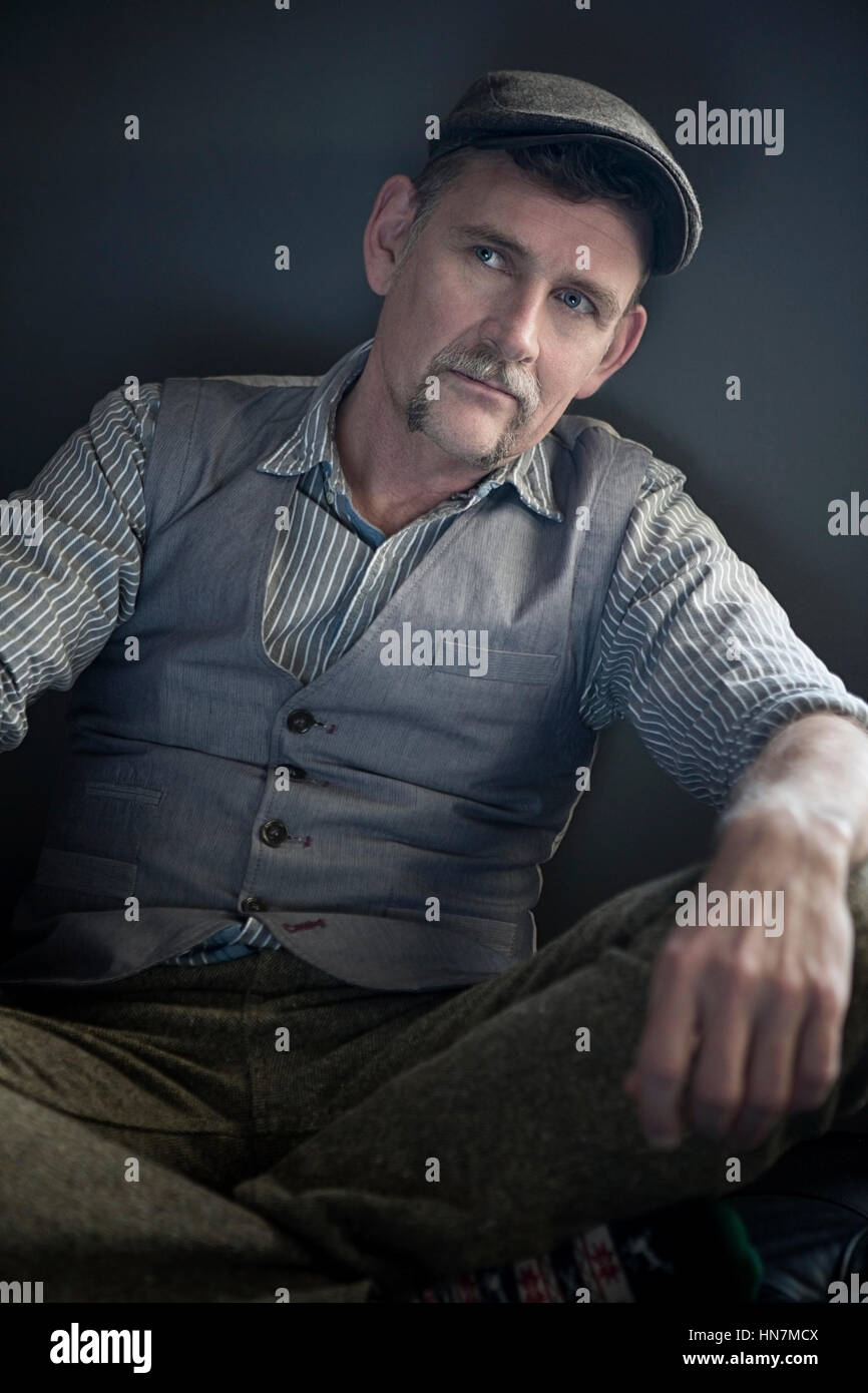 portrait of handsome stylish man in his 50s Stock Photo - Alamy
