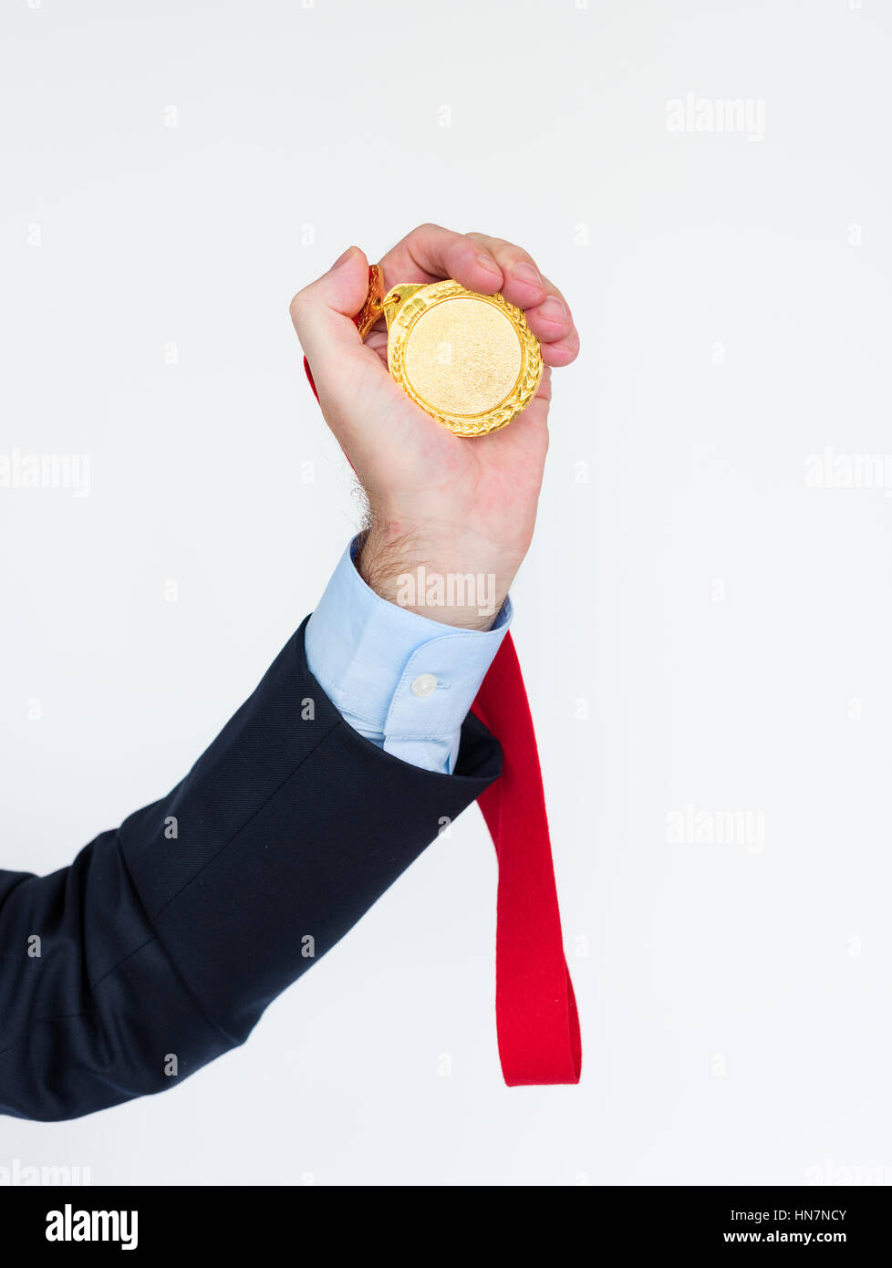 Human Hand Holding Medal Celebrate Winning Concept Stock Photo - Alamy