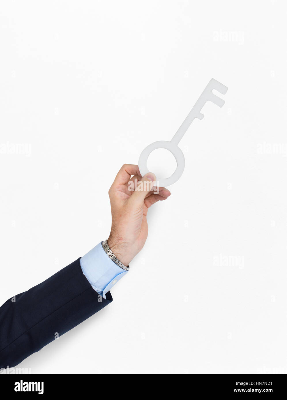 Business Man Holding Key Stock Photo - Alamy