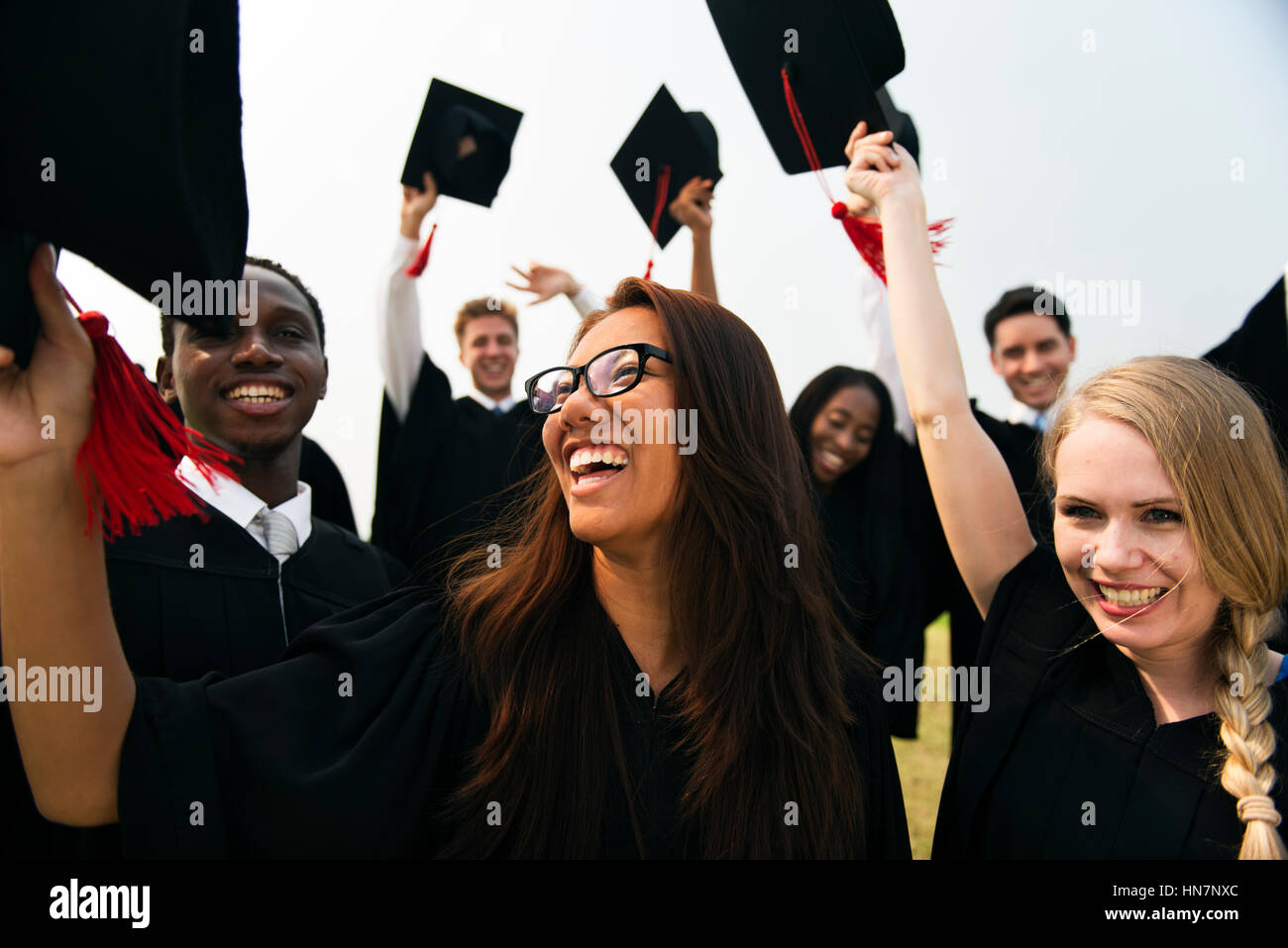 College graduation friends smiling hi-res stock photography and images ...