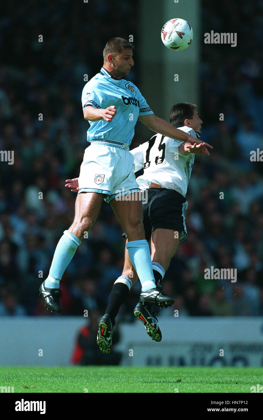 MICHAEL VONK RISES TO BEAT PAUL RIDOUT TO THE BALL. 27 August 1994 ...