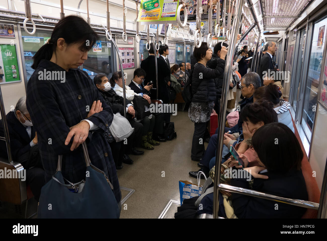 Japan commuters train hi-res stock photography and images - Alamy