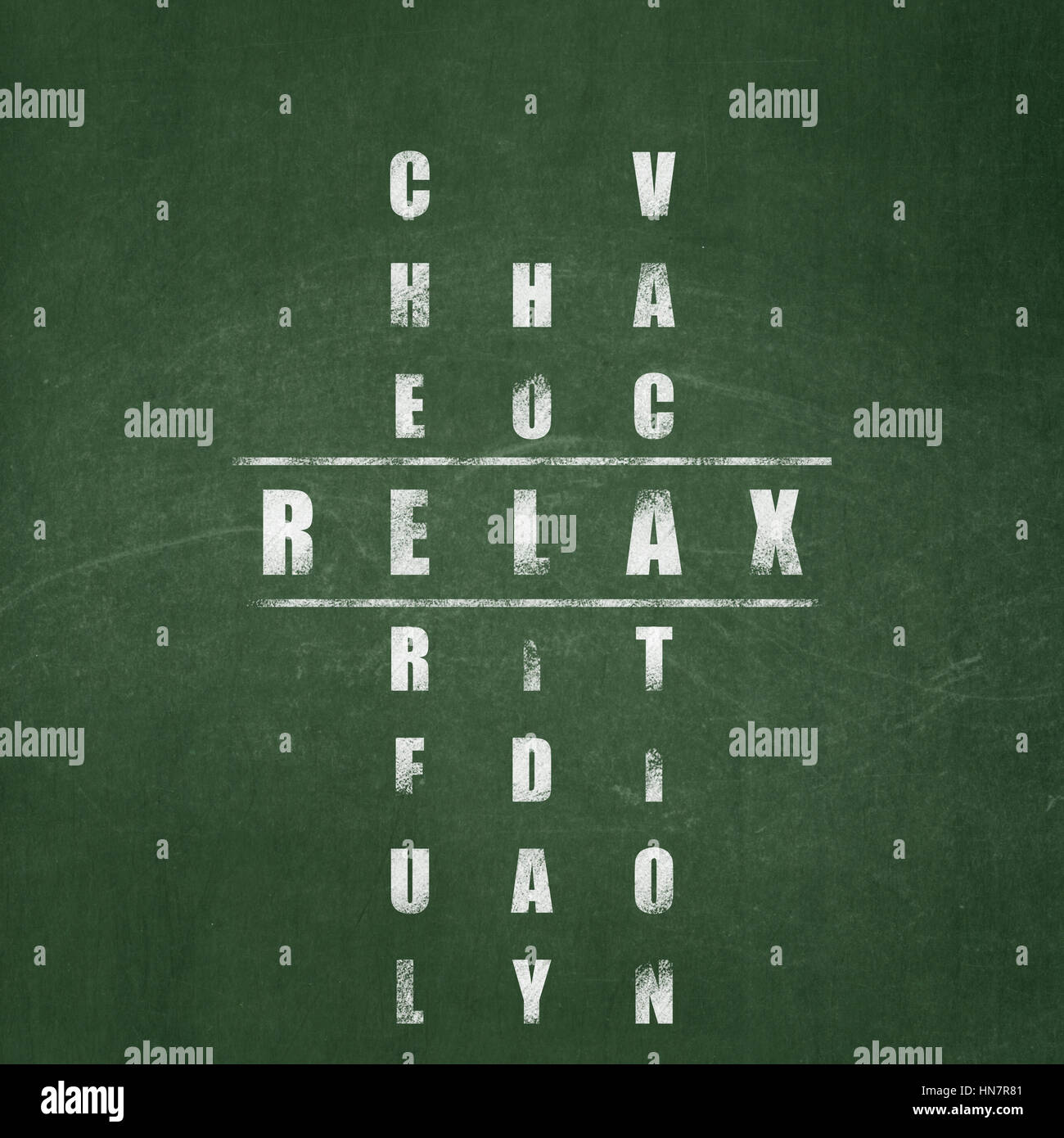 Entertainment, concept: Painted White word Relax in solving Crossword ...