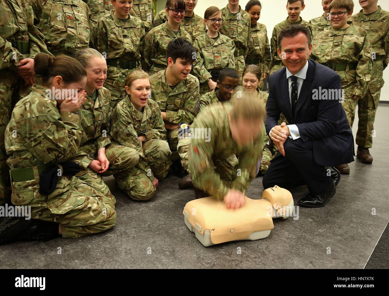 Defence Minister Mark Lancaster is shown a first aid demonstration ...