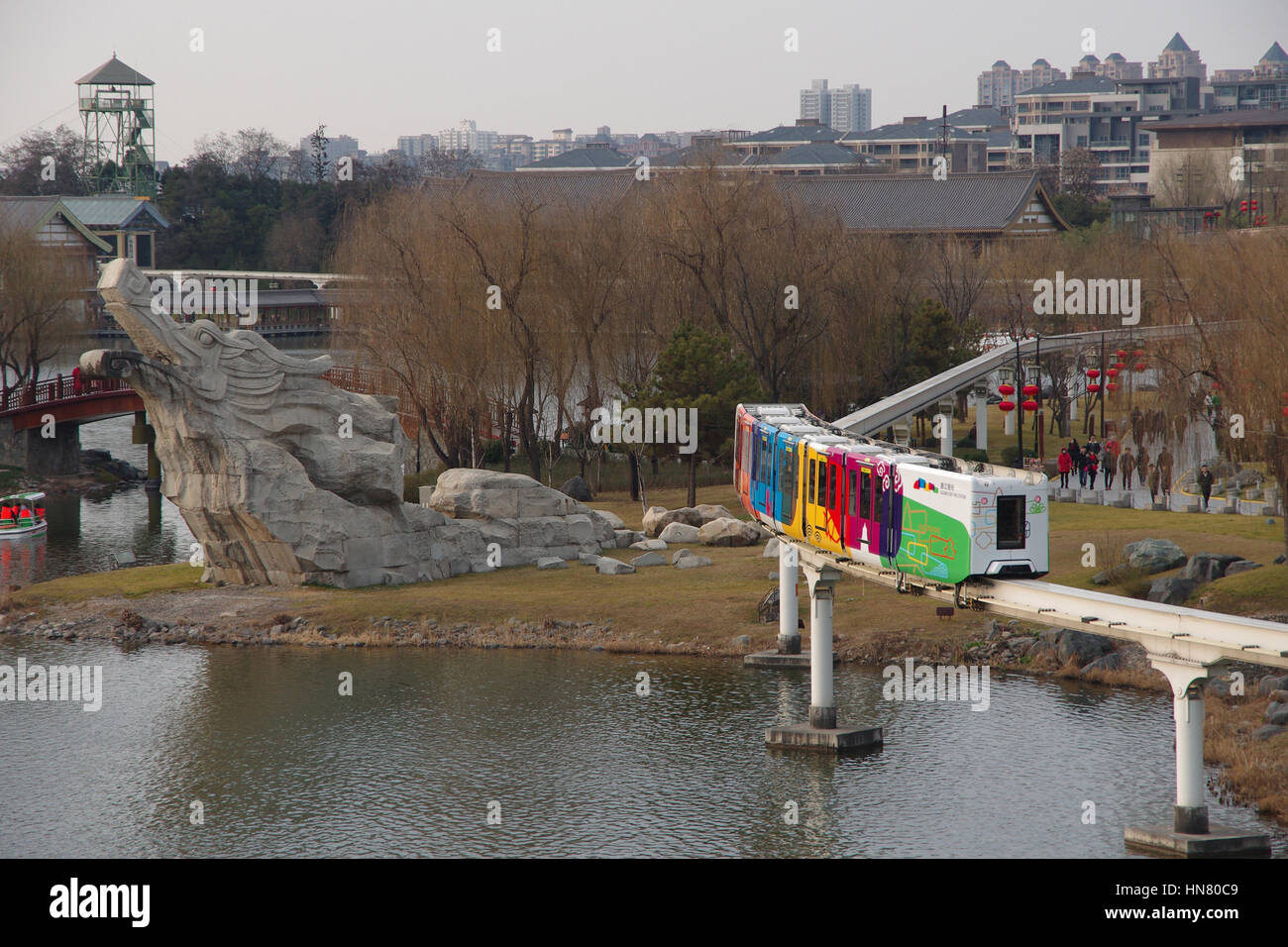 Xi'An, China. 8th Feb, 2017. A colourful sightseeing light rail train ...