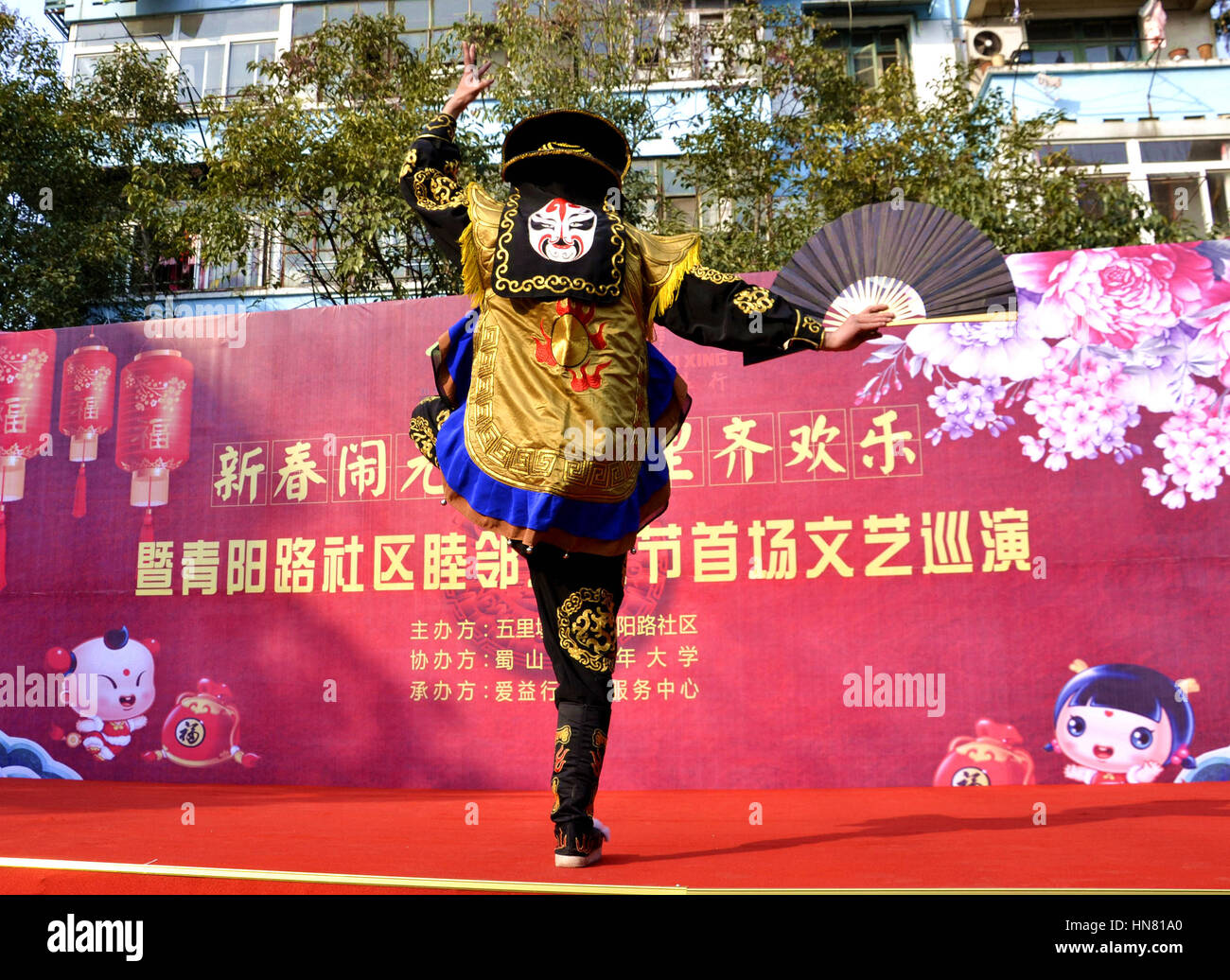 Hefei, China. 9th Feb, 2017. An actor performs face changing at a ...