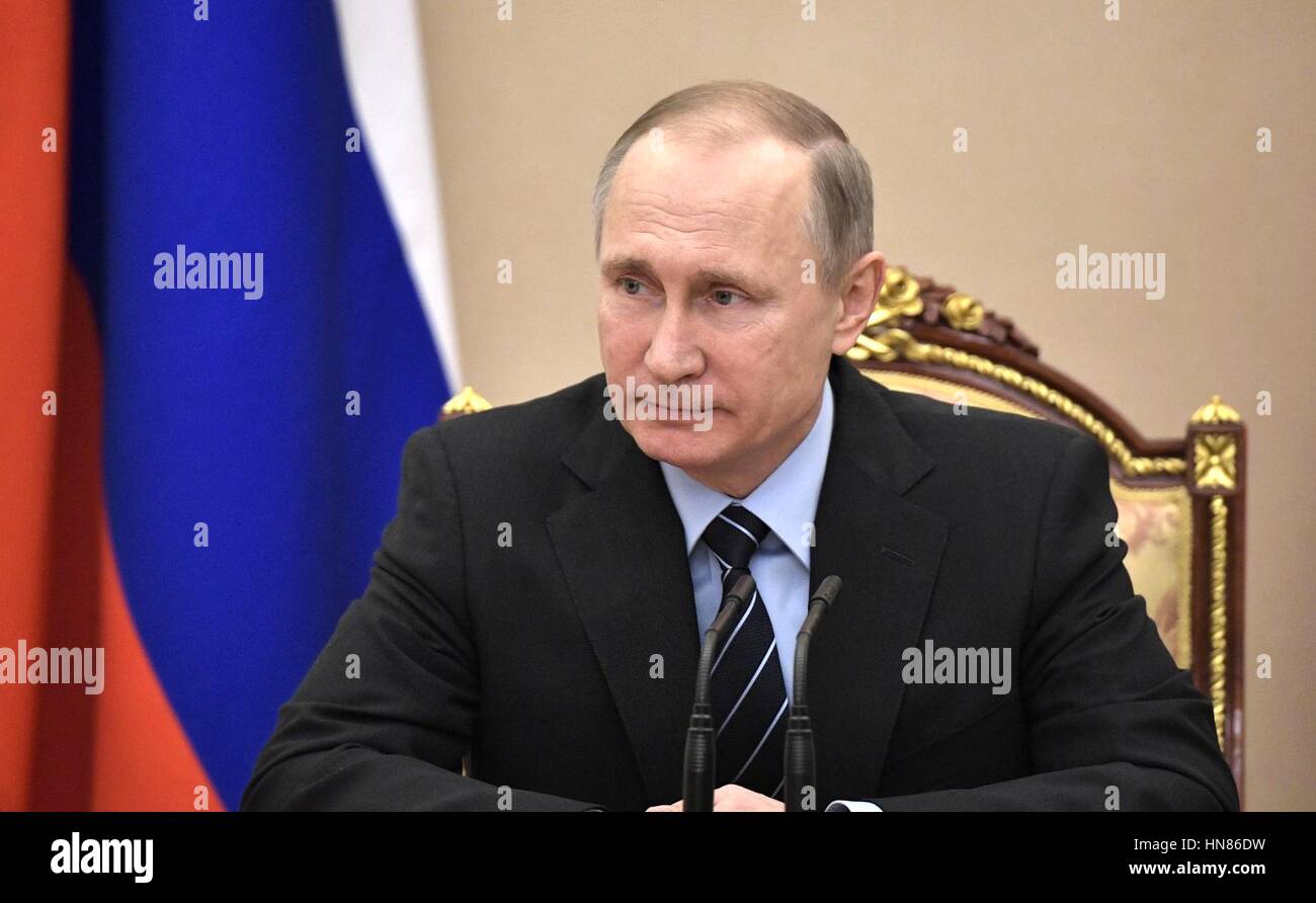 Meeting putin sitting hi-res stock photography and images - Alamy