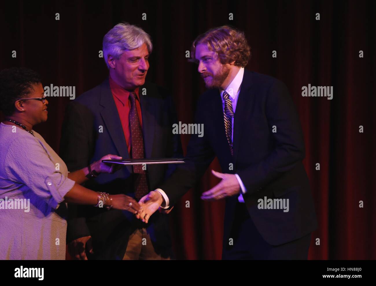 Los Angeles, California, USA. 18th Apr, 2015. Tom Bouma accepts the ...