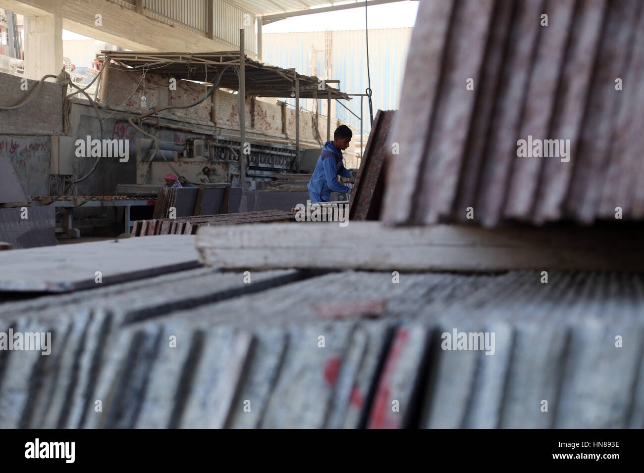 Cairo. 7th Feb, 2017. A man works in a marble and granite factory in ...
