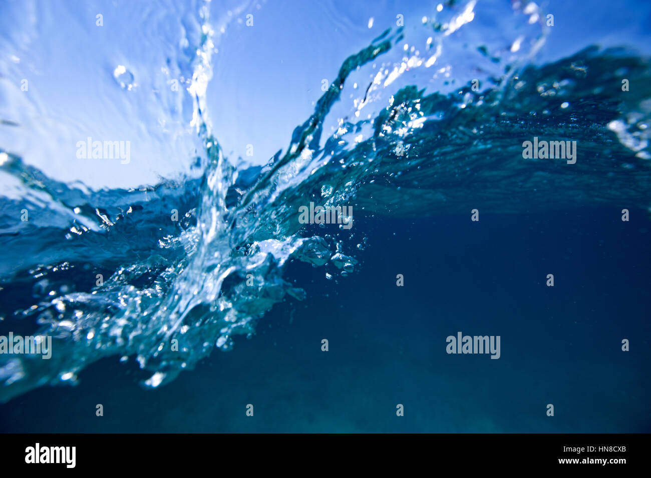 Wave splashes the camera Stock Photo - Alamy