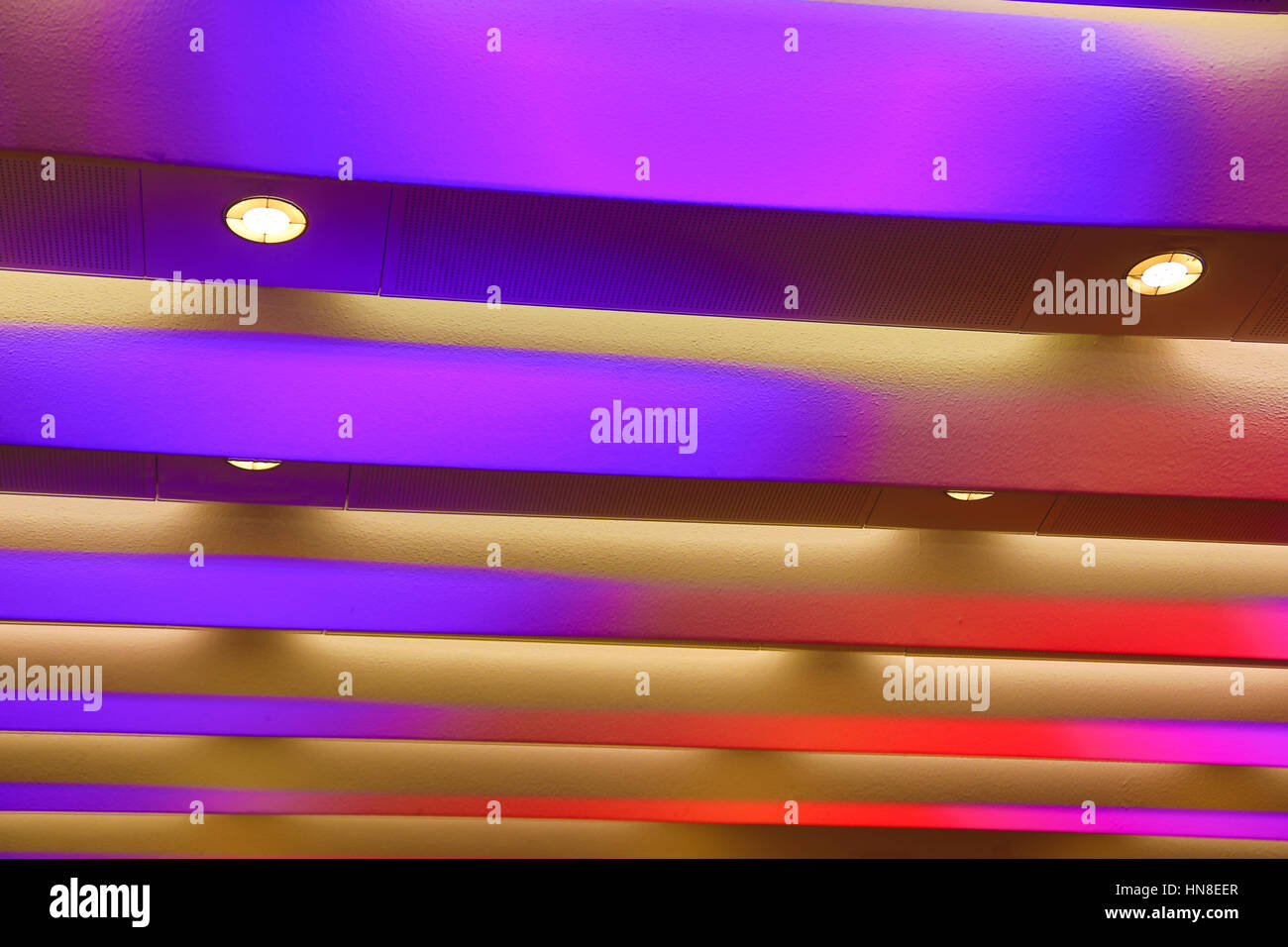 Ceiling illuminated by purple and pink lights Stock Photo - Alamy