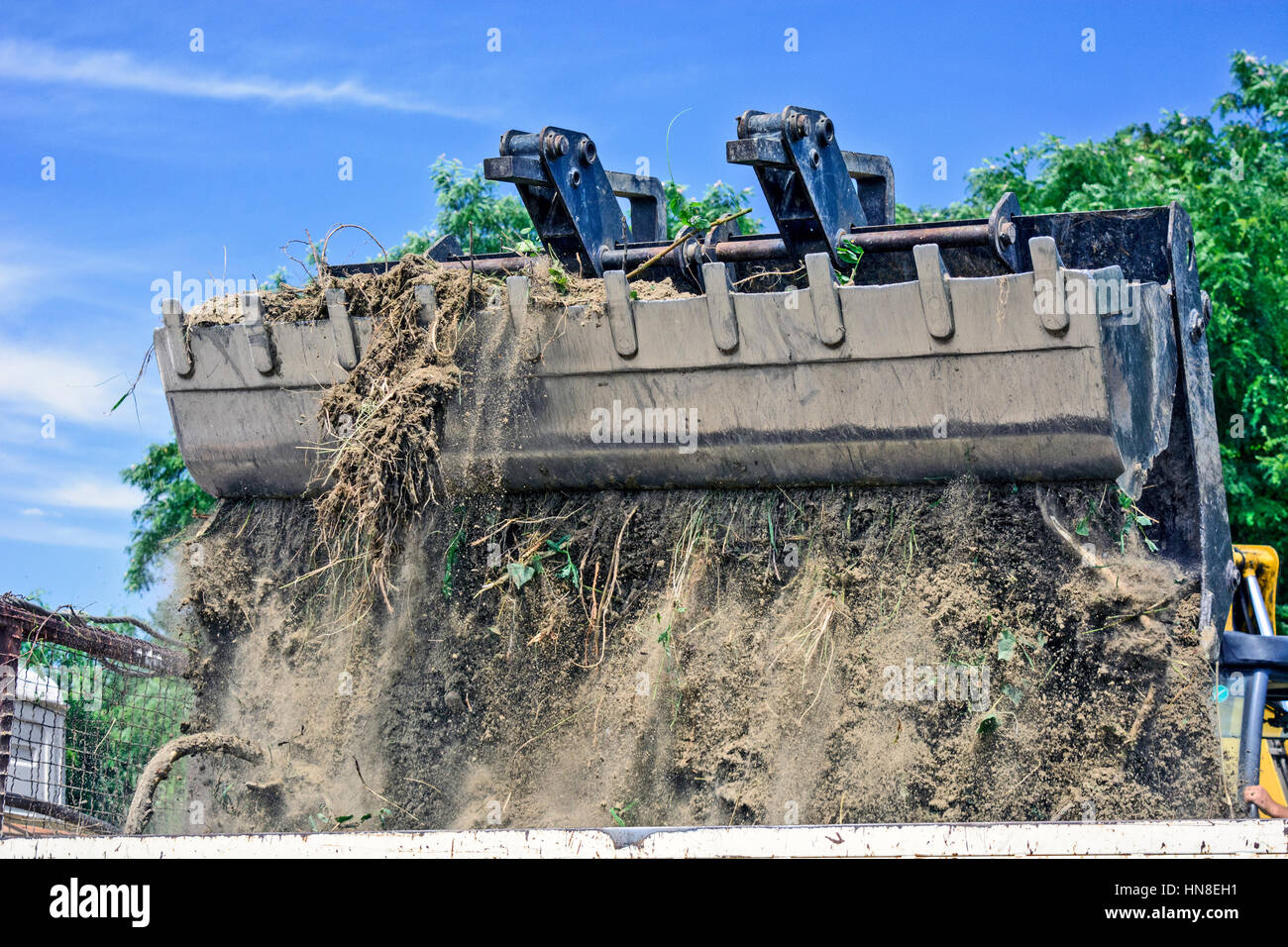 Loading construction rubble excavator hi-res stock photography and ...