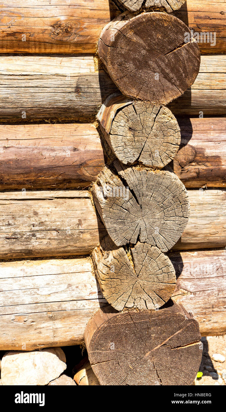 Old weathered and rotten log end rings cross section from wooden house ...