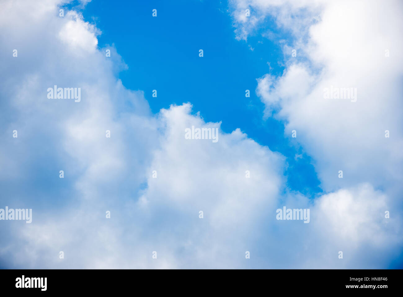 White clouds moving over blue hi-res stock photography and images - Alamy