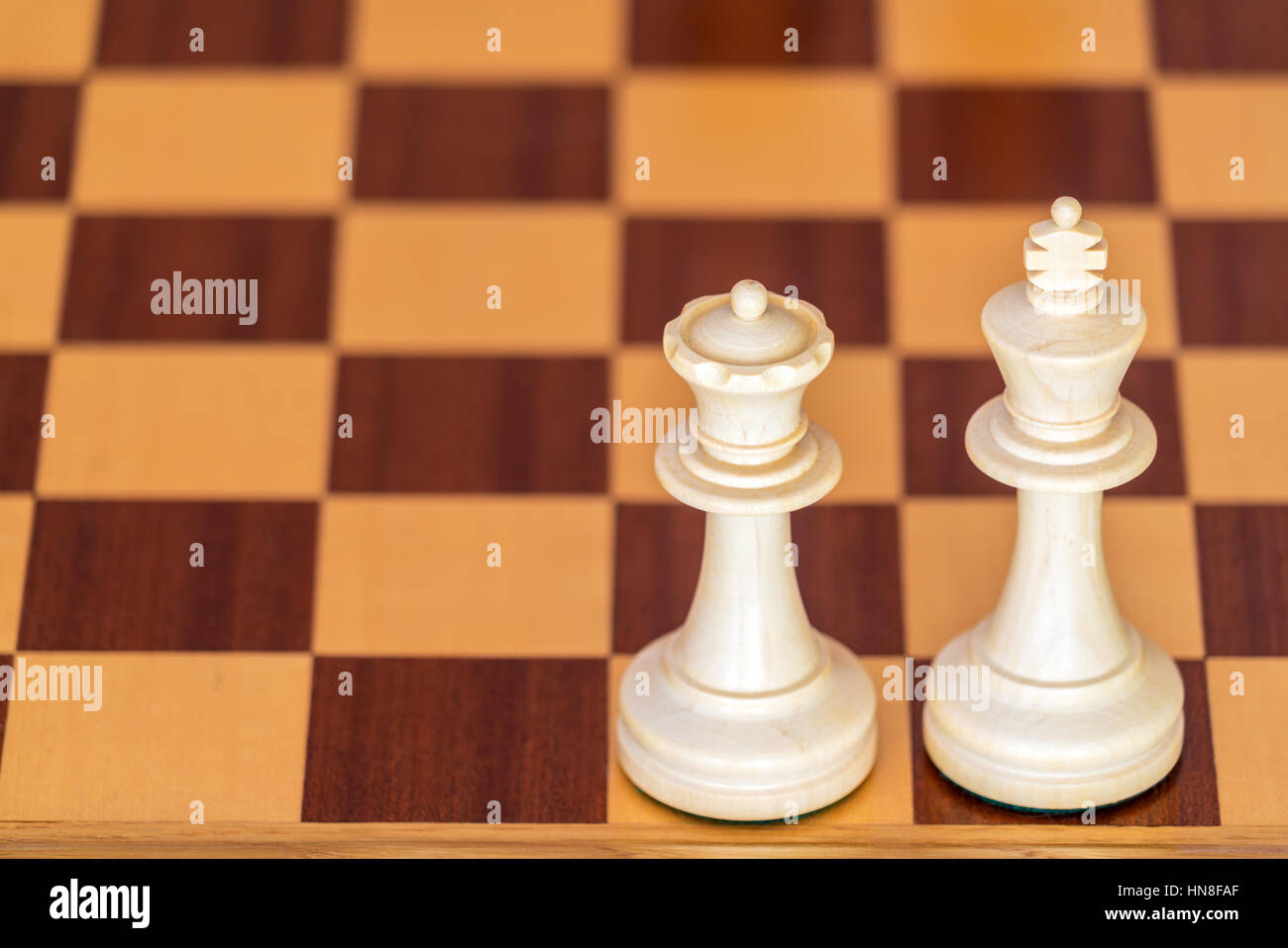 Freedom of choice in front of a young family in the form of chess ...