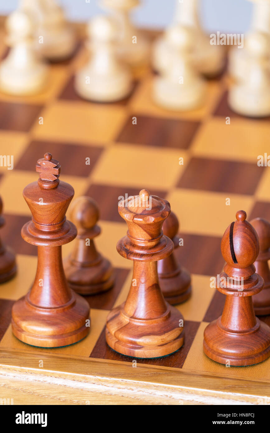 Chess pieces in starting position on a wooden oak Board Stock Photo - Alamy