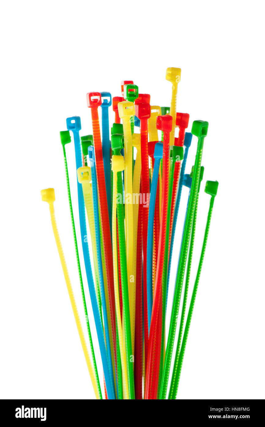 heap of colorful cable ties on white background Stock Photo - Alamy