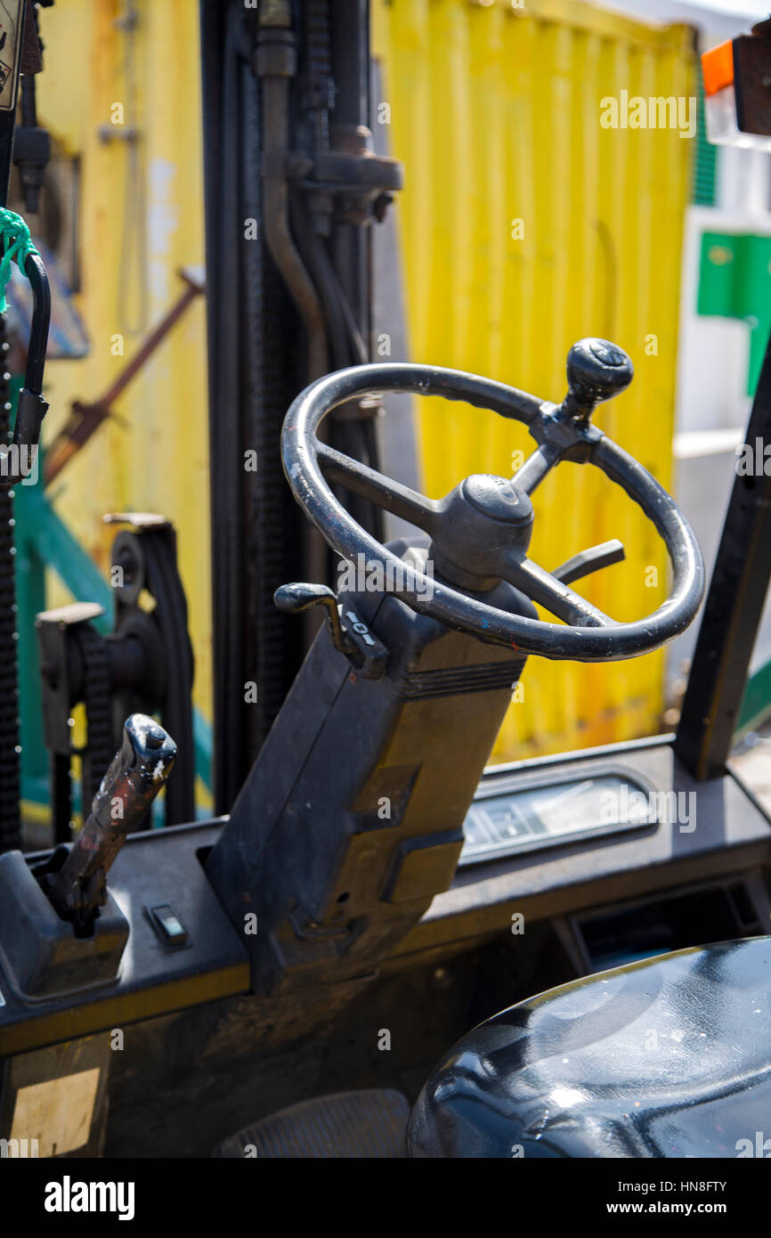 Closeup of the steering wheel of a machine Stock Photo - Alamy