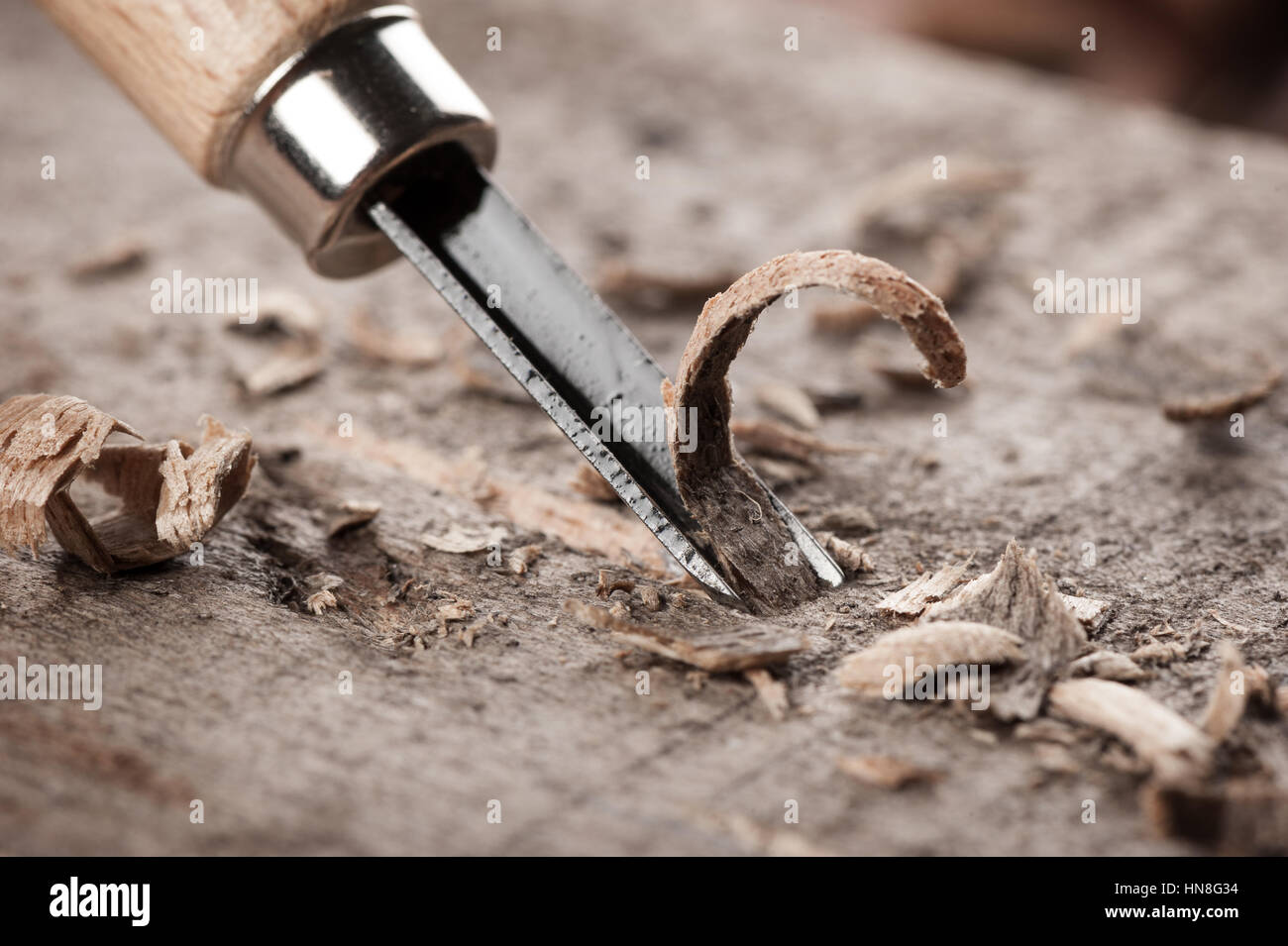 closeup chisels for wood on carpenter desktop Stock Photo - Alamy