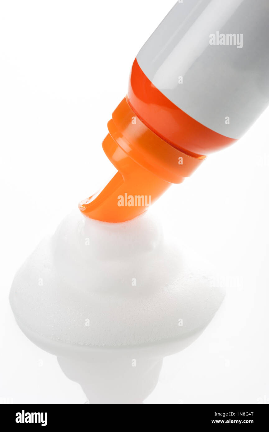 closeup white hair mousse on white background Stock Photo - Alamy
