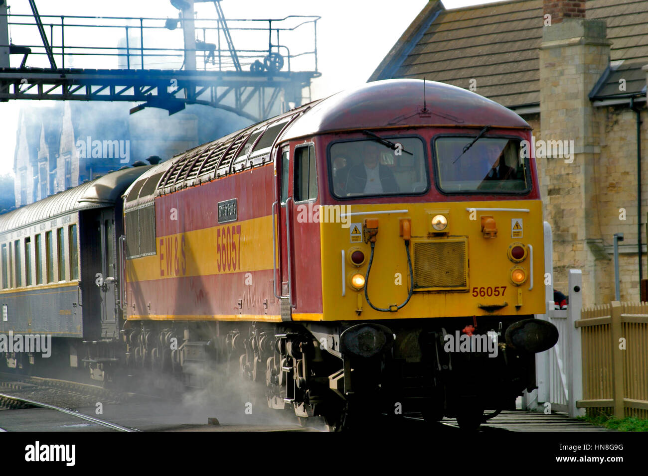 EWS diesel locomotive, number 56057, leaving Wansford Station, Nene ...