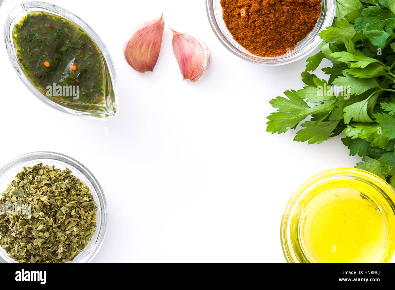 Green Chimichurri Sauce and ingredients isolated on white background ...