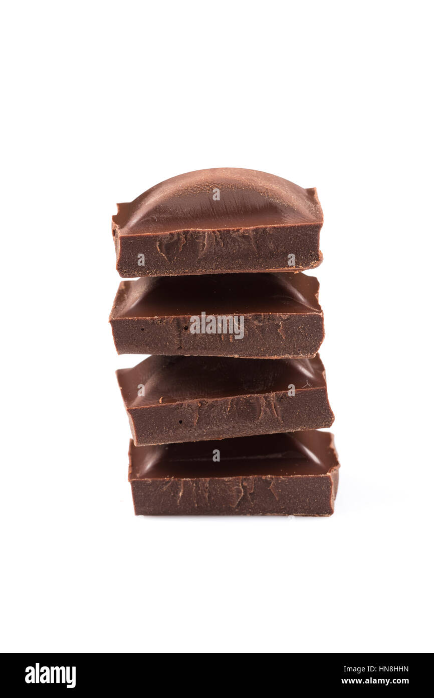 Stack of chocolate pieces on a white backgroun and isolated Stock Photo ...