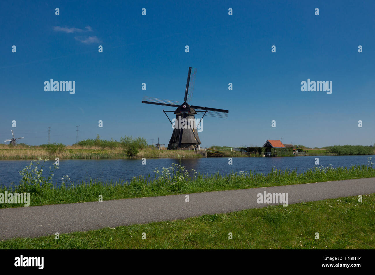 Historic Dutch windmills on the polders in Kinderdijk, South Holland ...