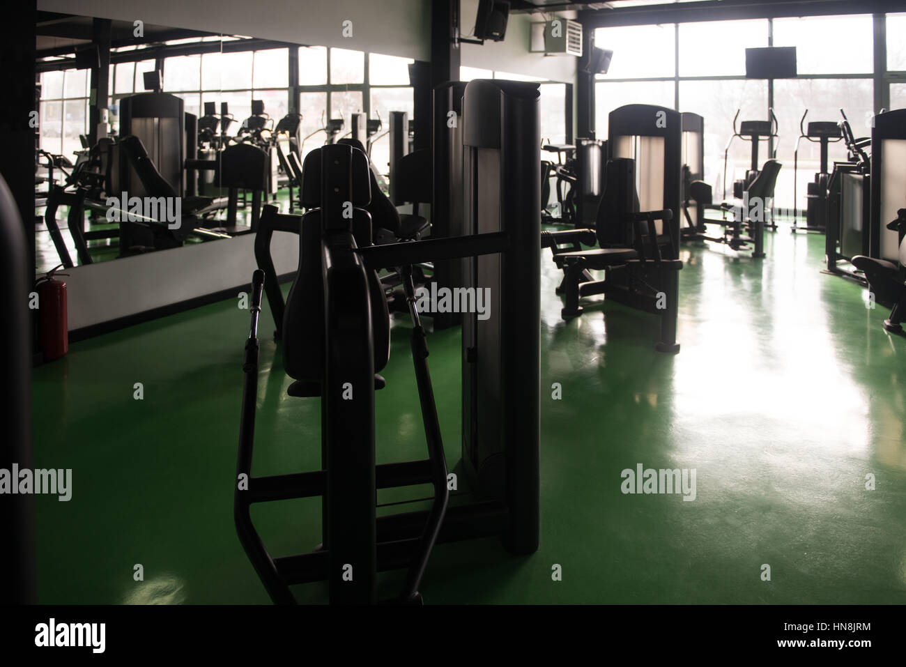 Modern Gym Room Fitness Center With Equipment And Machines Stock Photo ...