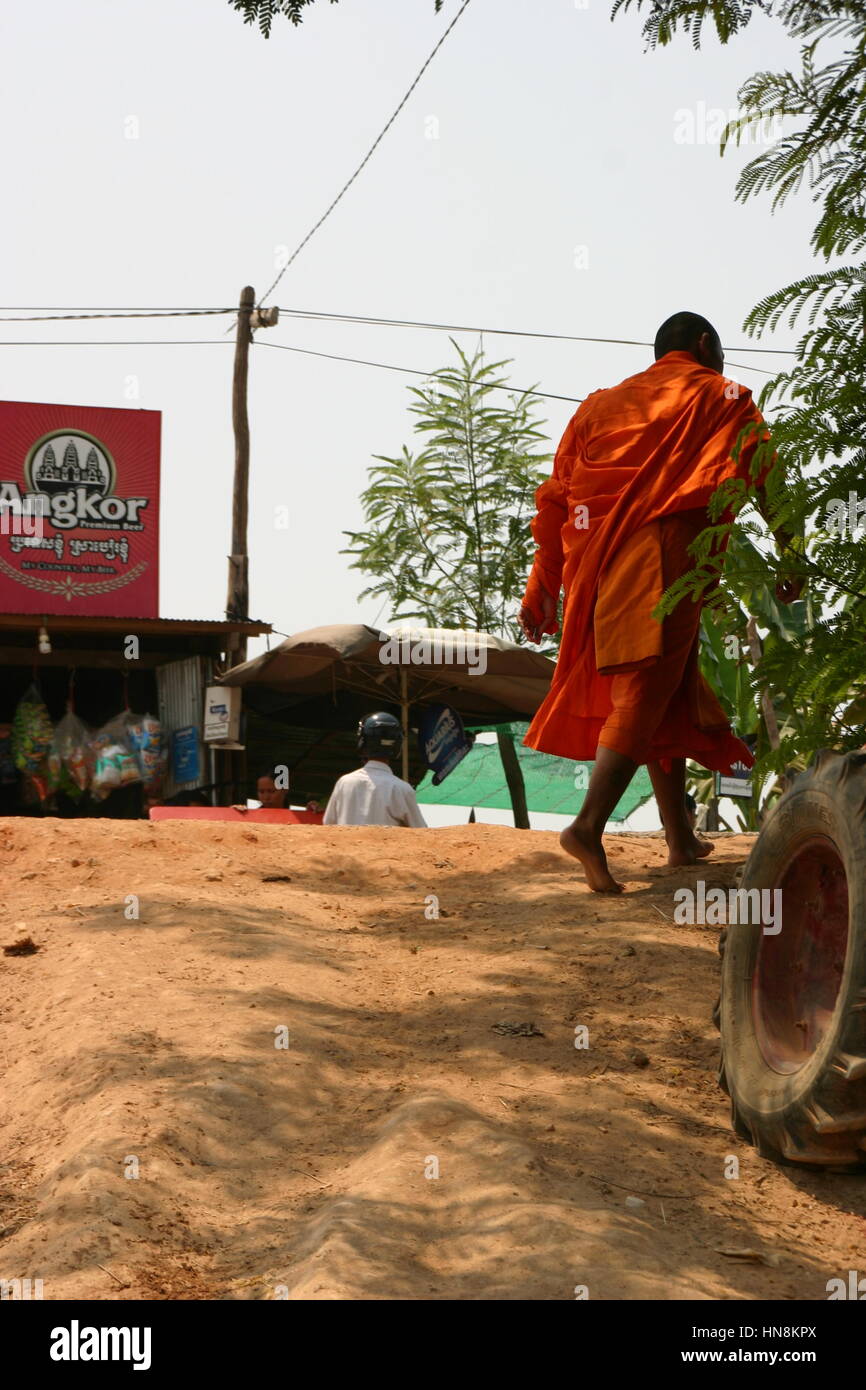 Buddhist monk leaving a temple after prayers Stock Photo - Alamy