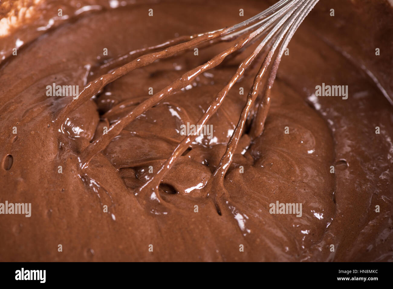 Mixing brownies ingredients in bowl hi-res stock photography and images ...