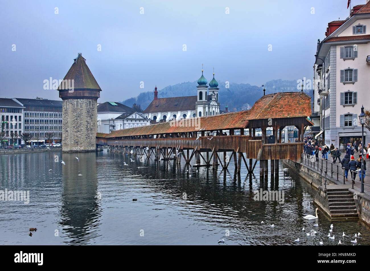 The famous Kapellbrücke ("Chapel Bridge"), a covered wooden footbridge ...