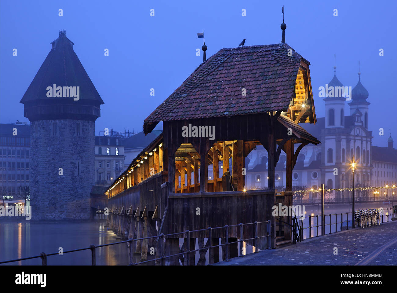 The famous Kapellbrücke ("Chapel Bridge"), a covered wooden footbridge ...