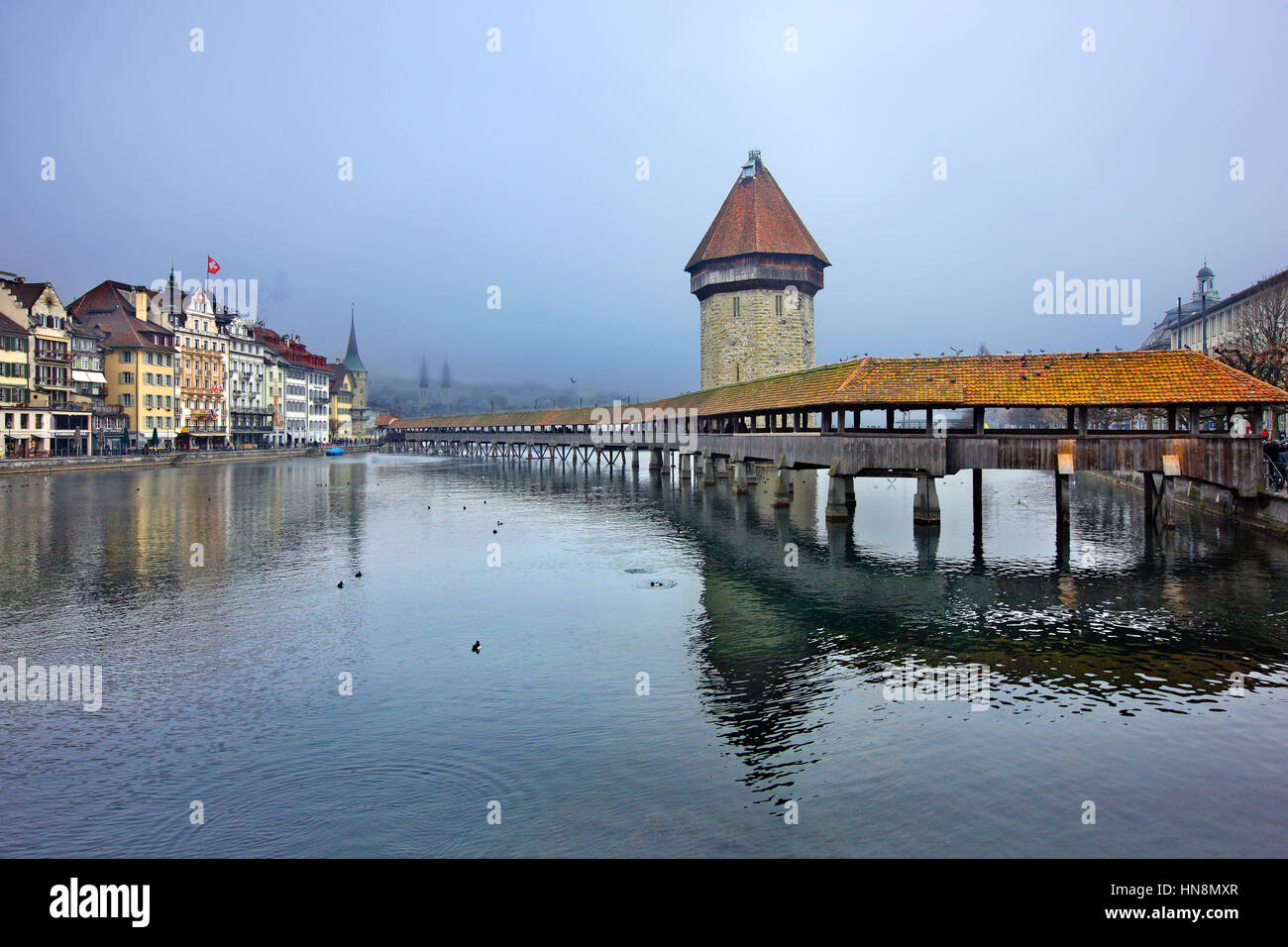 The famous Kapellbrücke ("Chapel Bridge"), a covered wooden footbridge ...