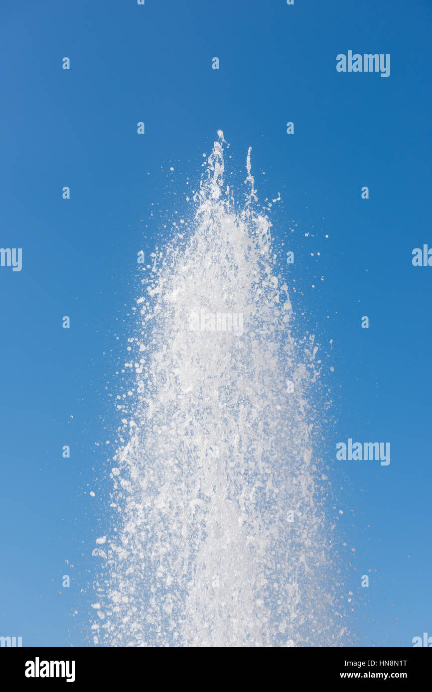 closeup water splash over blue sky Stock Photo - Alamy