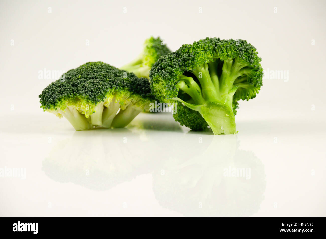 Photograph of broccoli on white background Stock Photo - Alamy