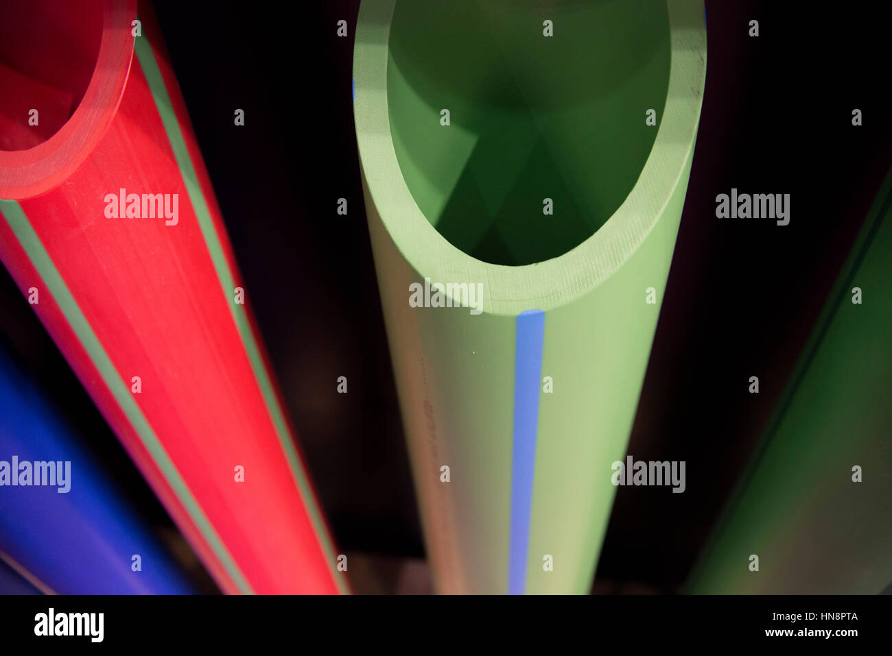blue green and red plastic PPR PE pipeline tubes Stock Photo - Alamy
