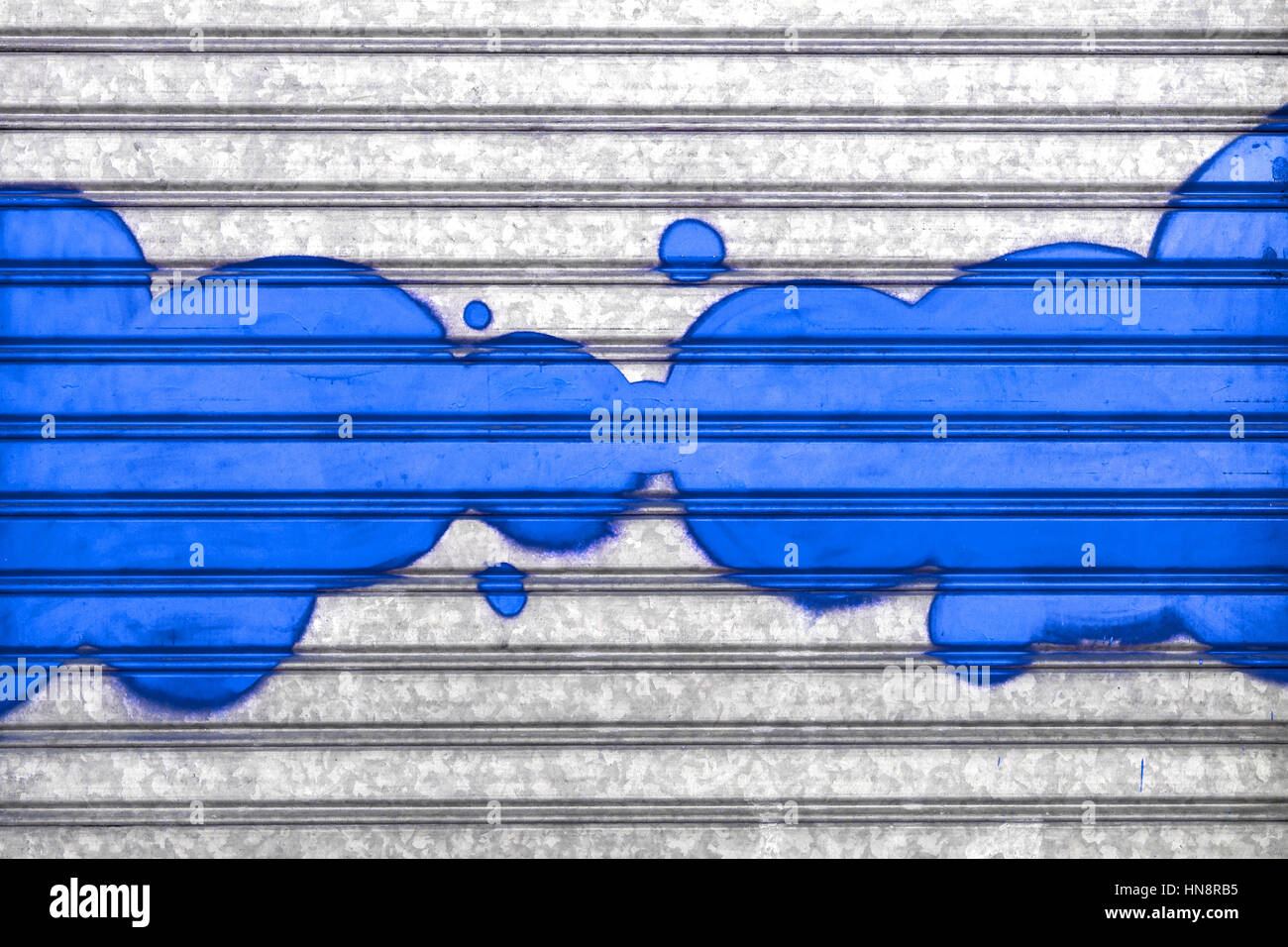 Street art painted on roller shutter hi-res stock photography and ...