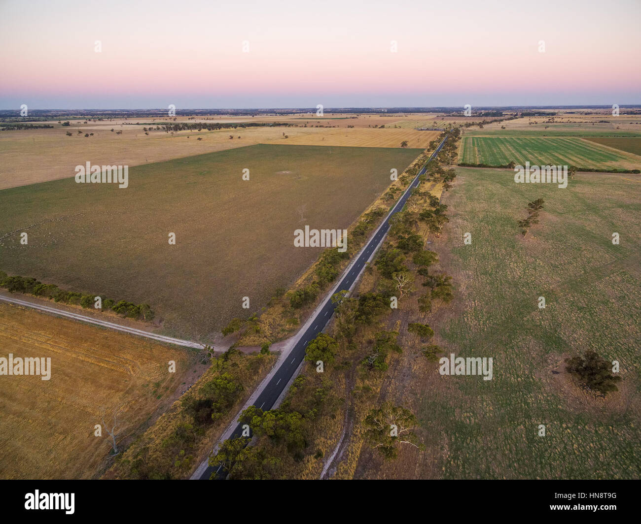 Rural Australian agricultural landscape at sunset Stock Photo - Alamy
