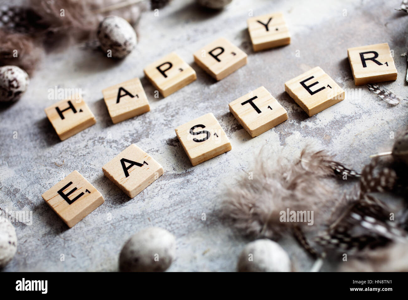 Happy Easter written with wooden letters Stock Photo - Alamy