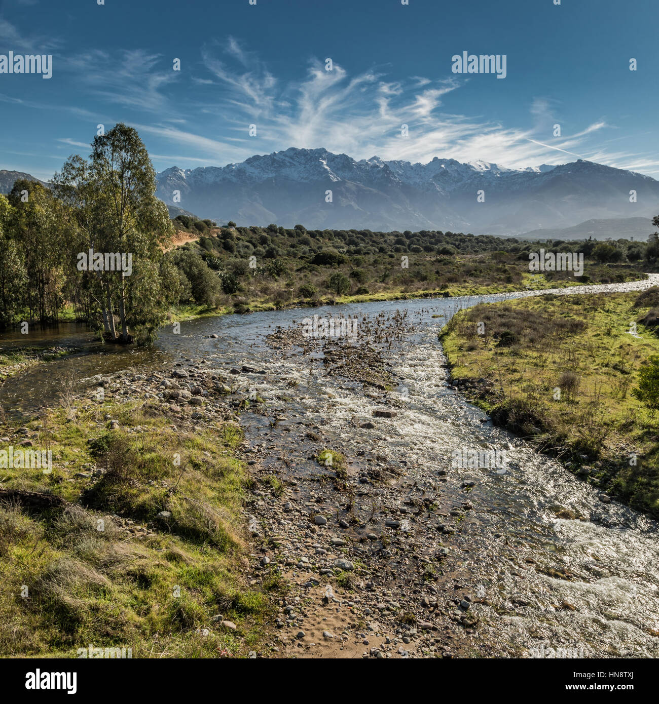 Shallow fast flowing stream near Calvi in the Balagne region of Corsica ...