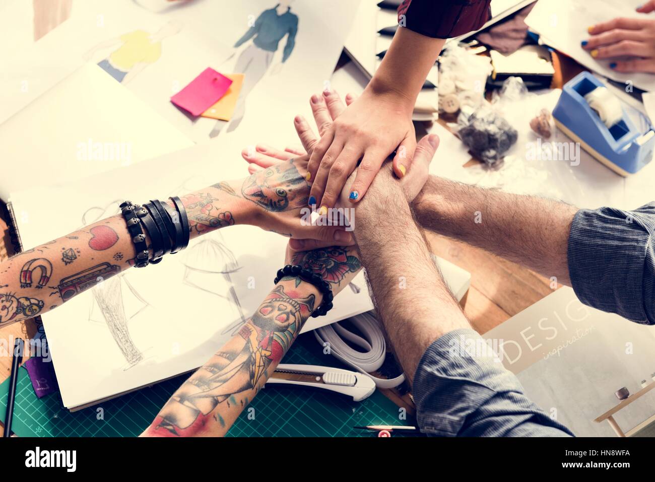 Fashion designer drawing costume teamwork hi-res stock photography and ...