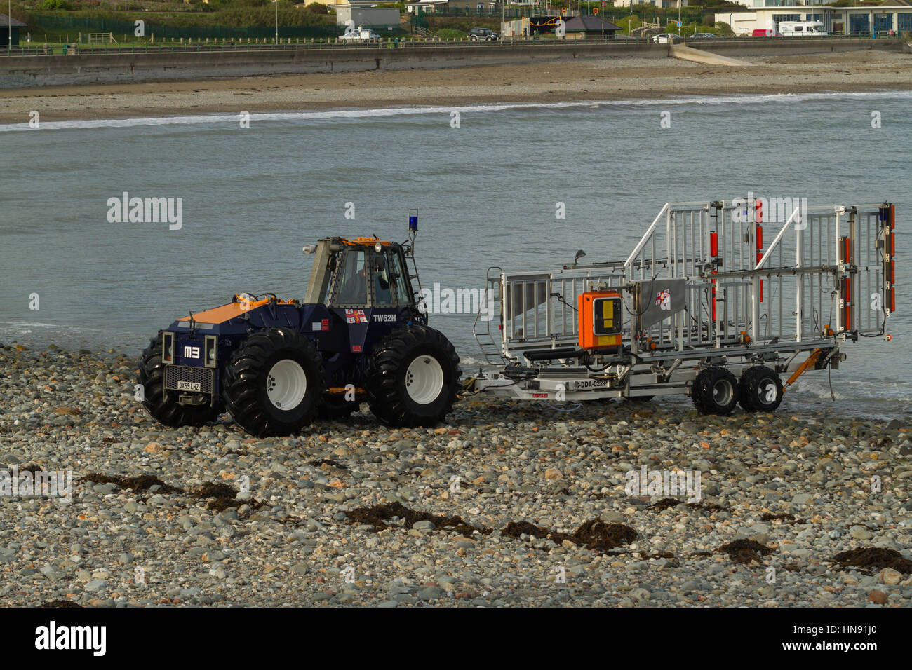 RNLI Lifeboat Inshore RIB tractor launcher off Criccieth Beach North ...