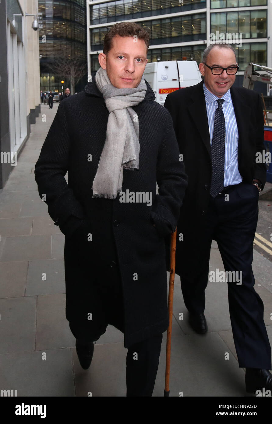 NOTE ALTERNATE CROP Nick Candy (left) arrives at the Rolls Building in ...