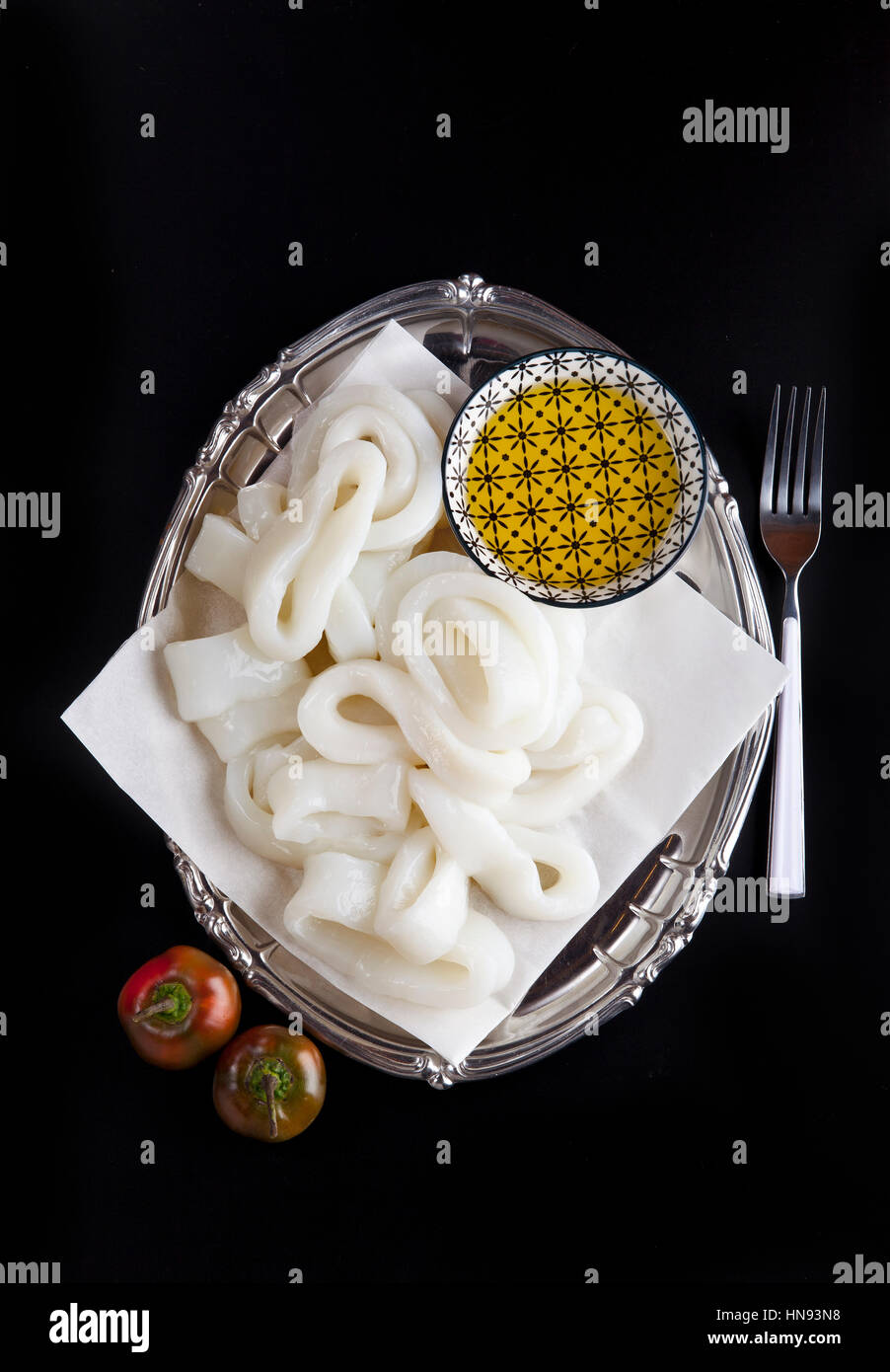 Raw squid rings hi-res stock photography and images - Alamy